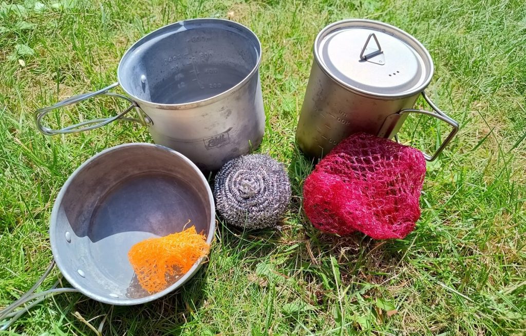 Cleaning pots on trail | Hike for Purpose